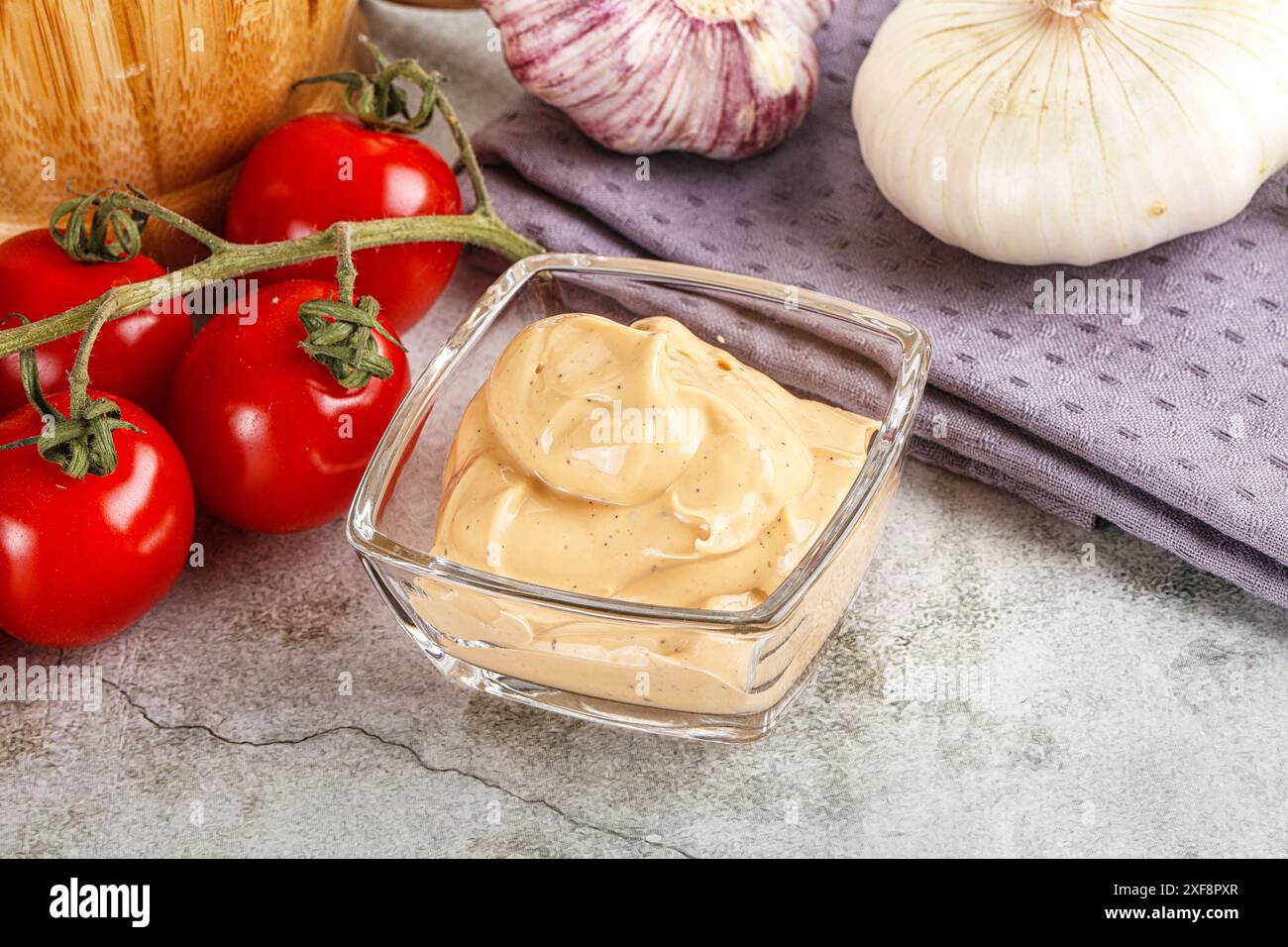Bowl of Yellow cream grill sauce for burger Stock Photo - Alamy
