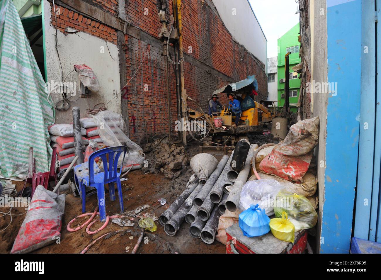 construction worker at a building site, employee in construction ...