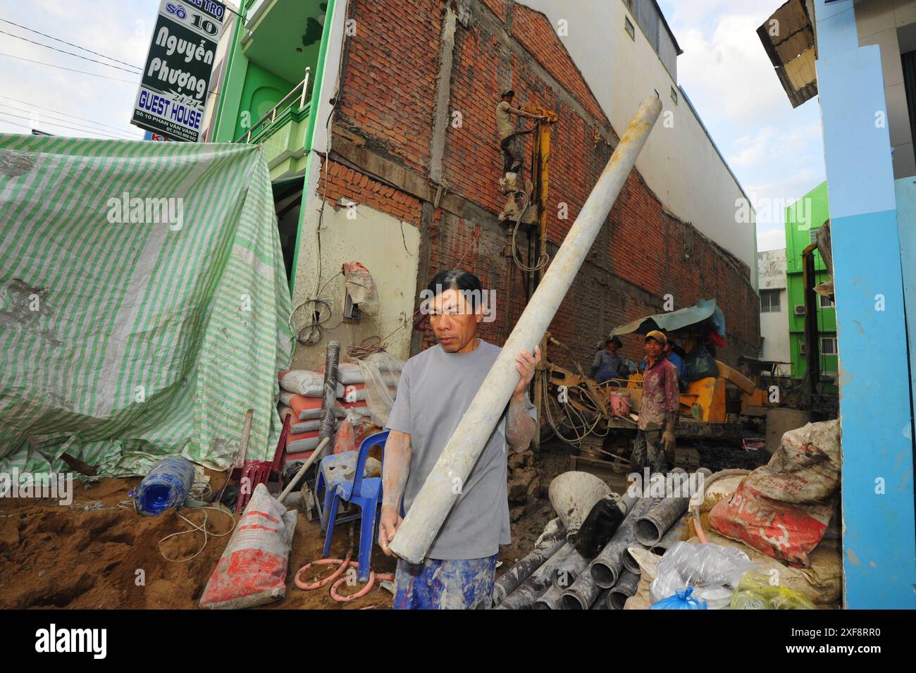 construction worker at a building site, employee in construction ...