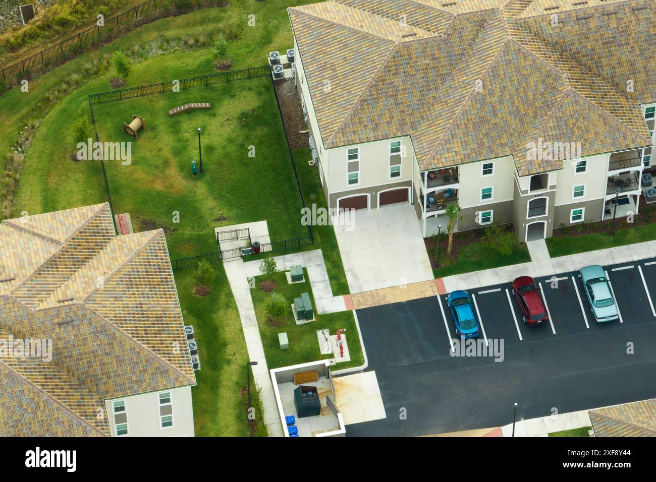 Aerial view of cars parked on parking places at american apartment ...