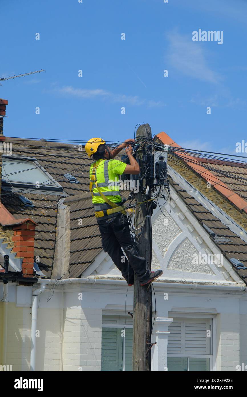 BT Telephone Engineer on a London Street Stock Photo - Alamy