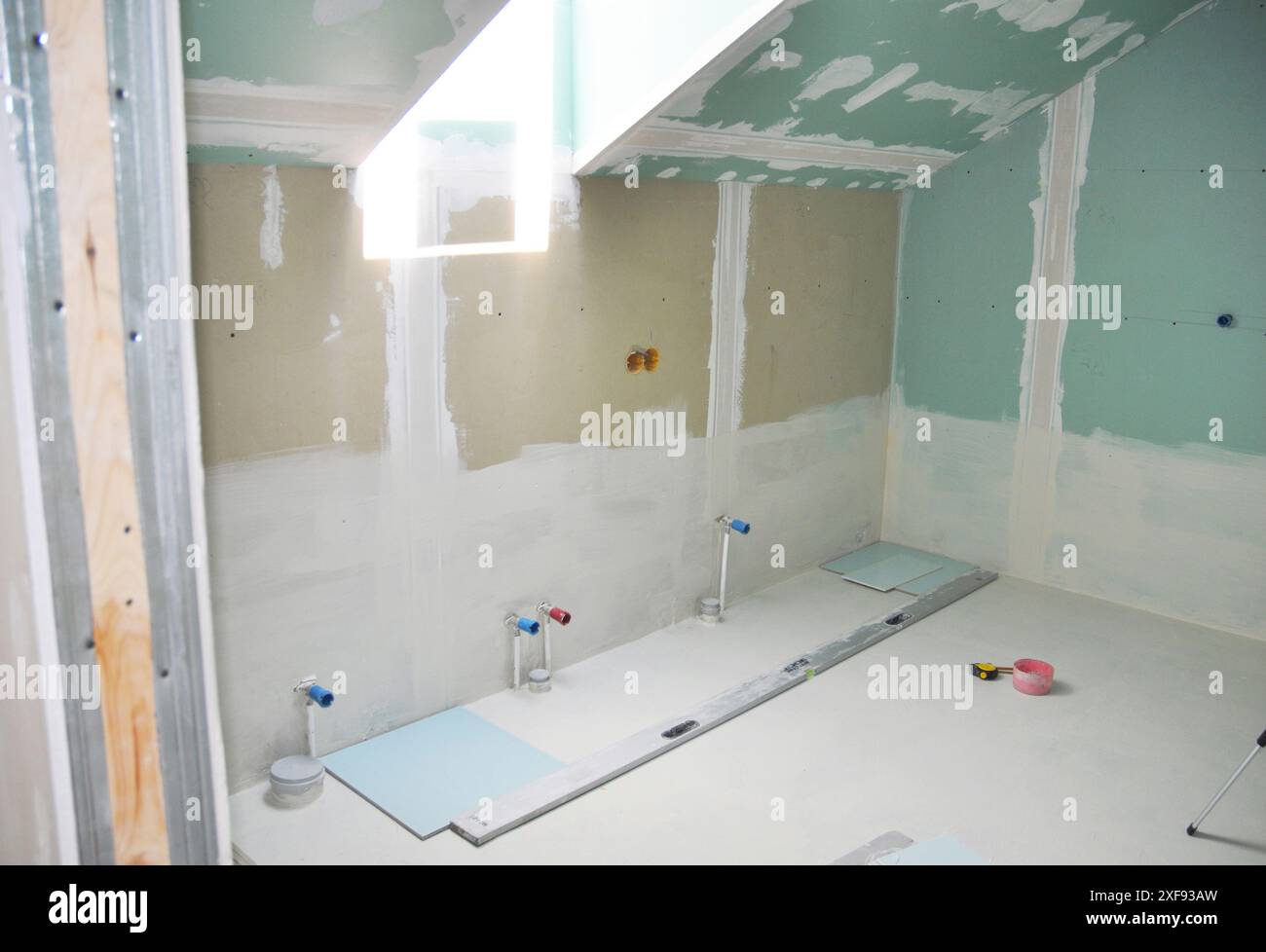 Close up on house attic bathroom remodeling indoor. Skylight window ...