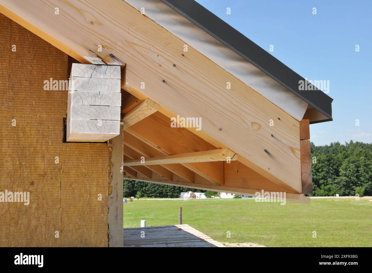 Close up on house roof corner eaves with no fascia and soffit Stock ...