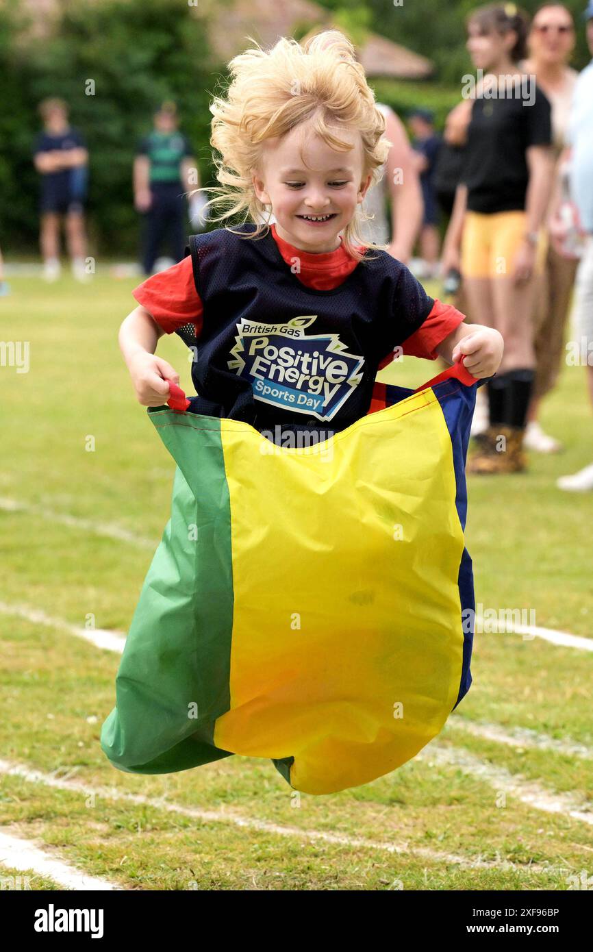 EDITORIAL USE ONLY Reception pupil, Freddie participates in the sack ...