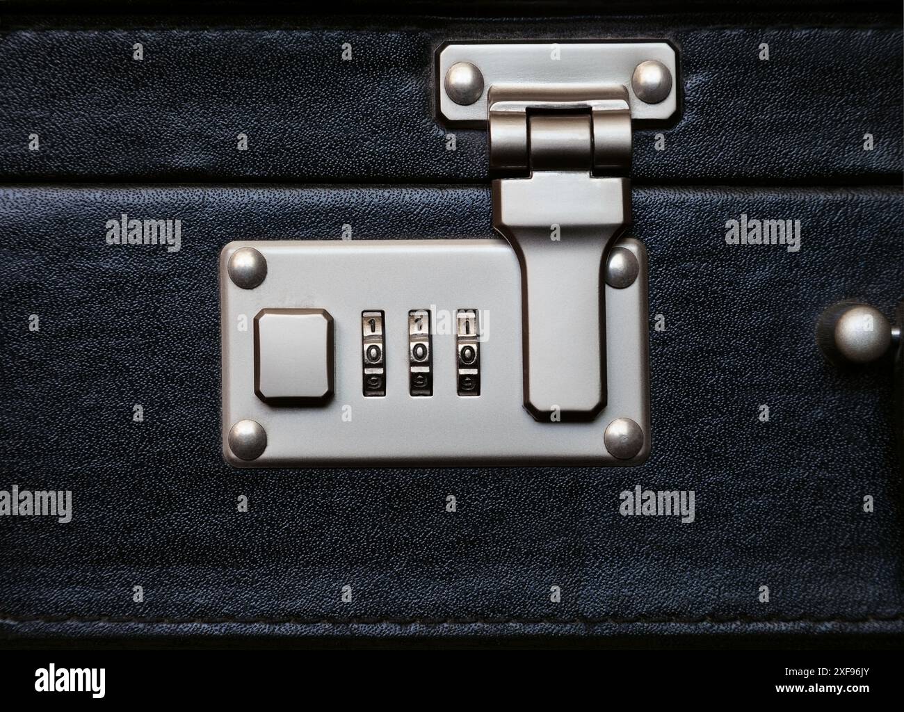 Fragment of a case with a combination lock, close-up Stock Photo - Alamy