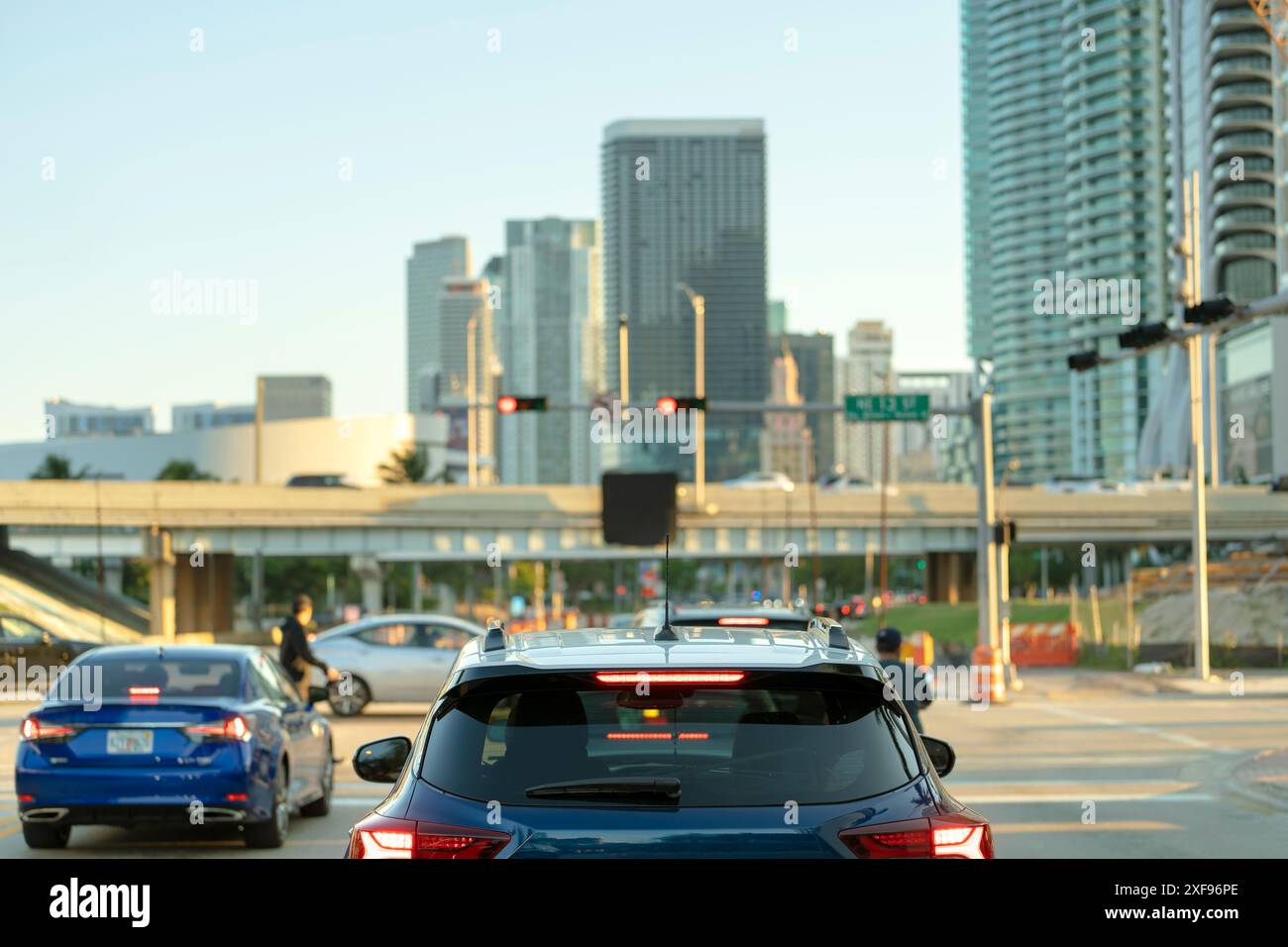 Cars traffic driving at intersection on American street with traffic ...