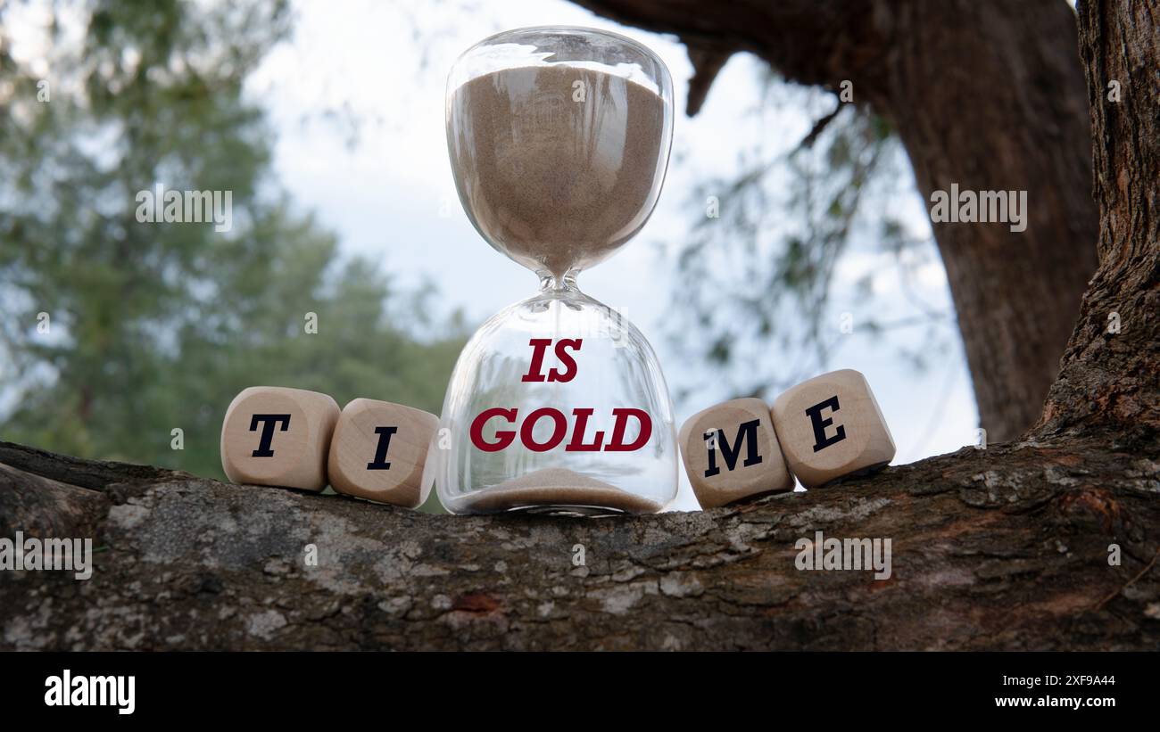 time concept with hourglass and sunrise at a beach. Time is gold quote ...