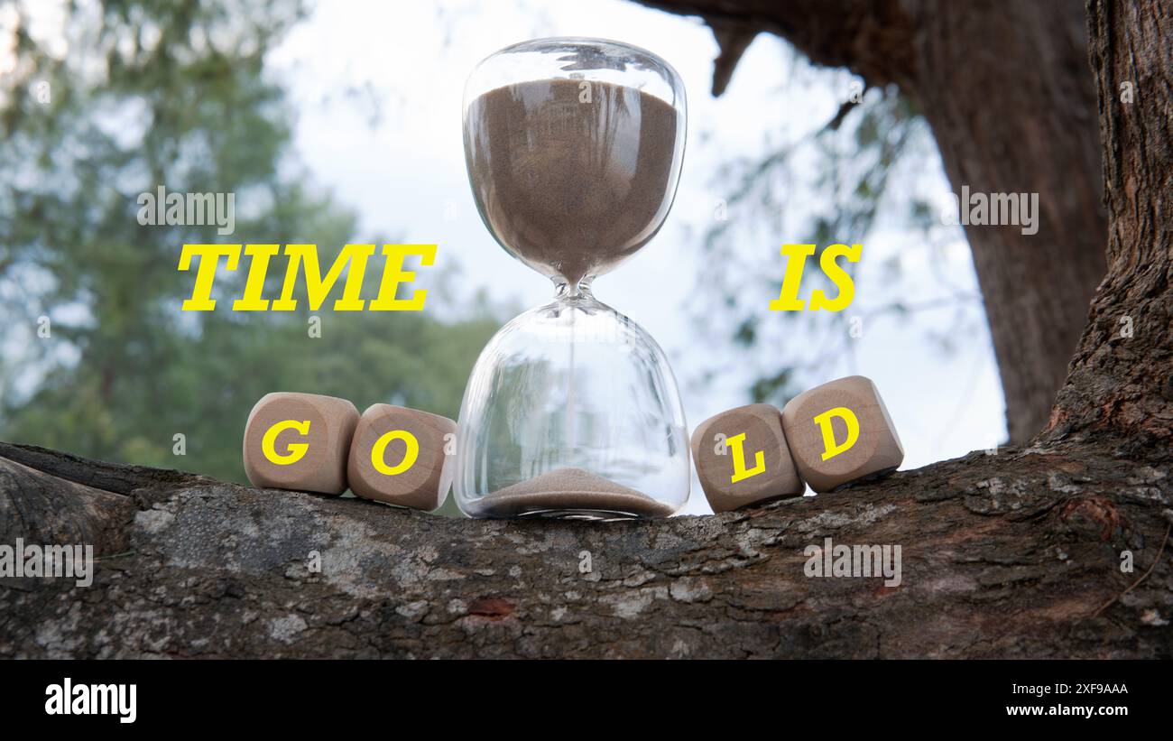 time concept with hourglass and sunrise at a beach. Time is gold quote ...