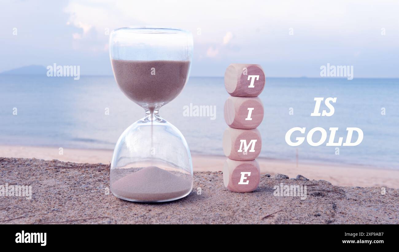 time concept with hourglass and sunrise at a beach. Time is gold quote ...