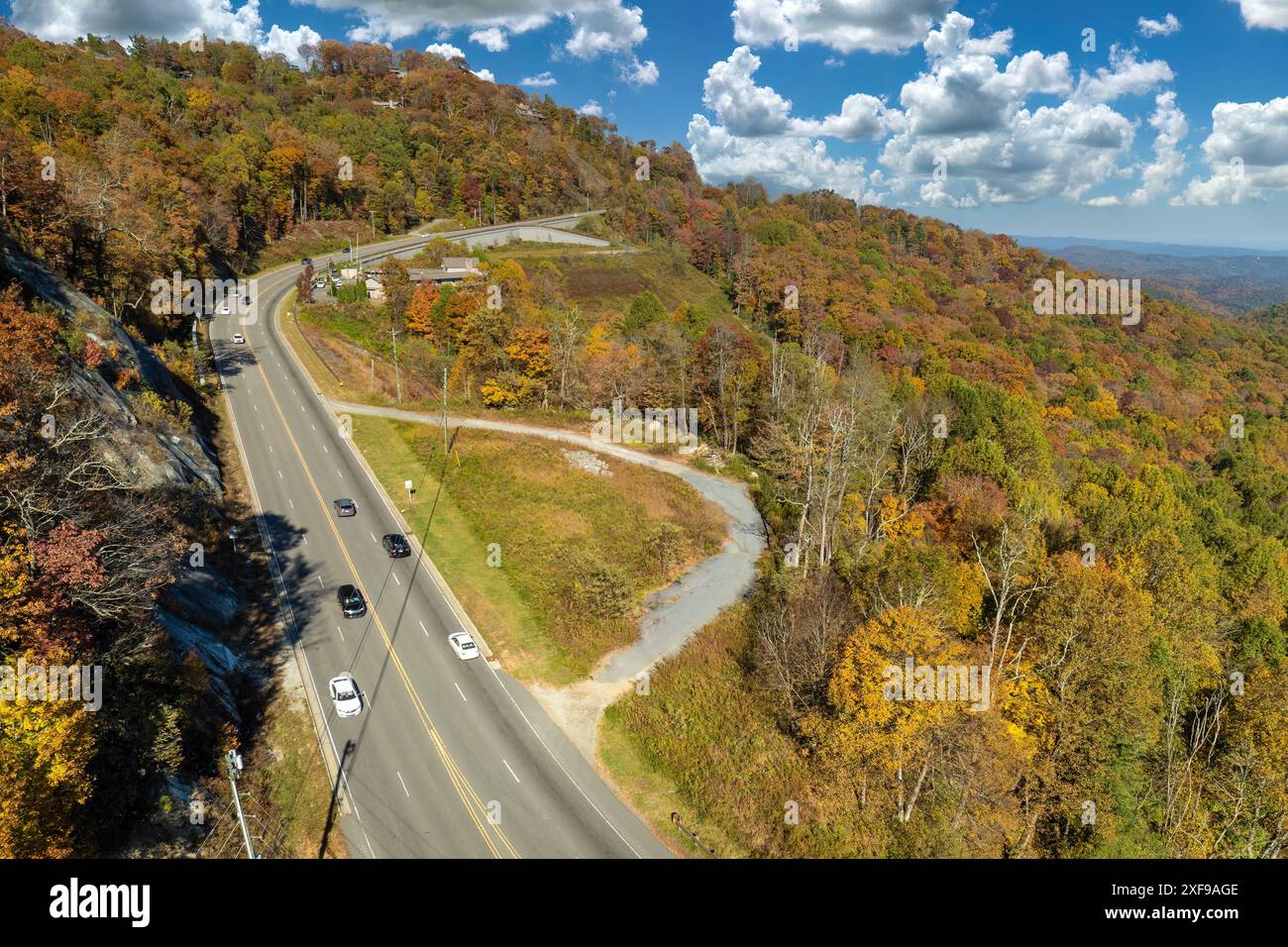 Freeway road with fast moving traffic cars and trucks in North Carolina ...