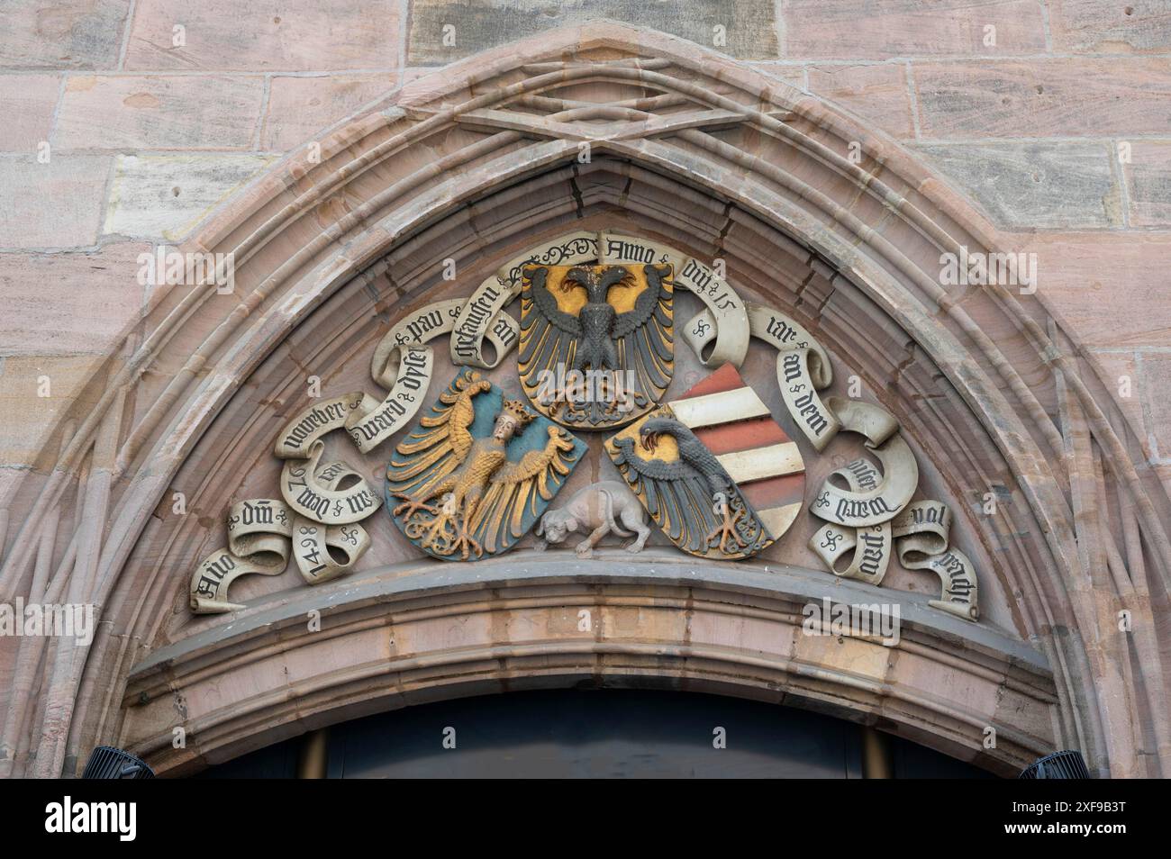 East side with coat of arms above the entrance gate, historic toll hall ...