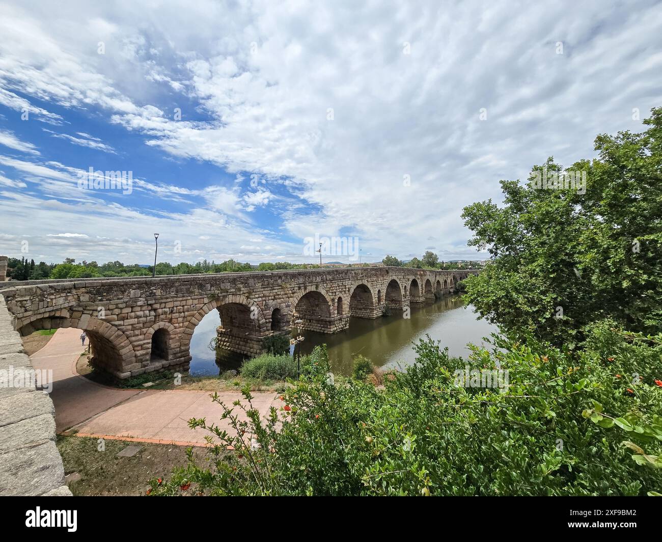 Historic roman bridge over the Guadiana river in Merida, Spain Stock ...