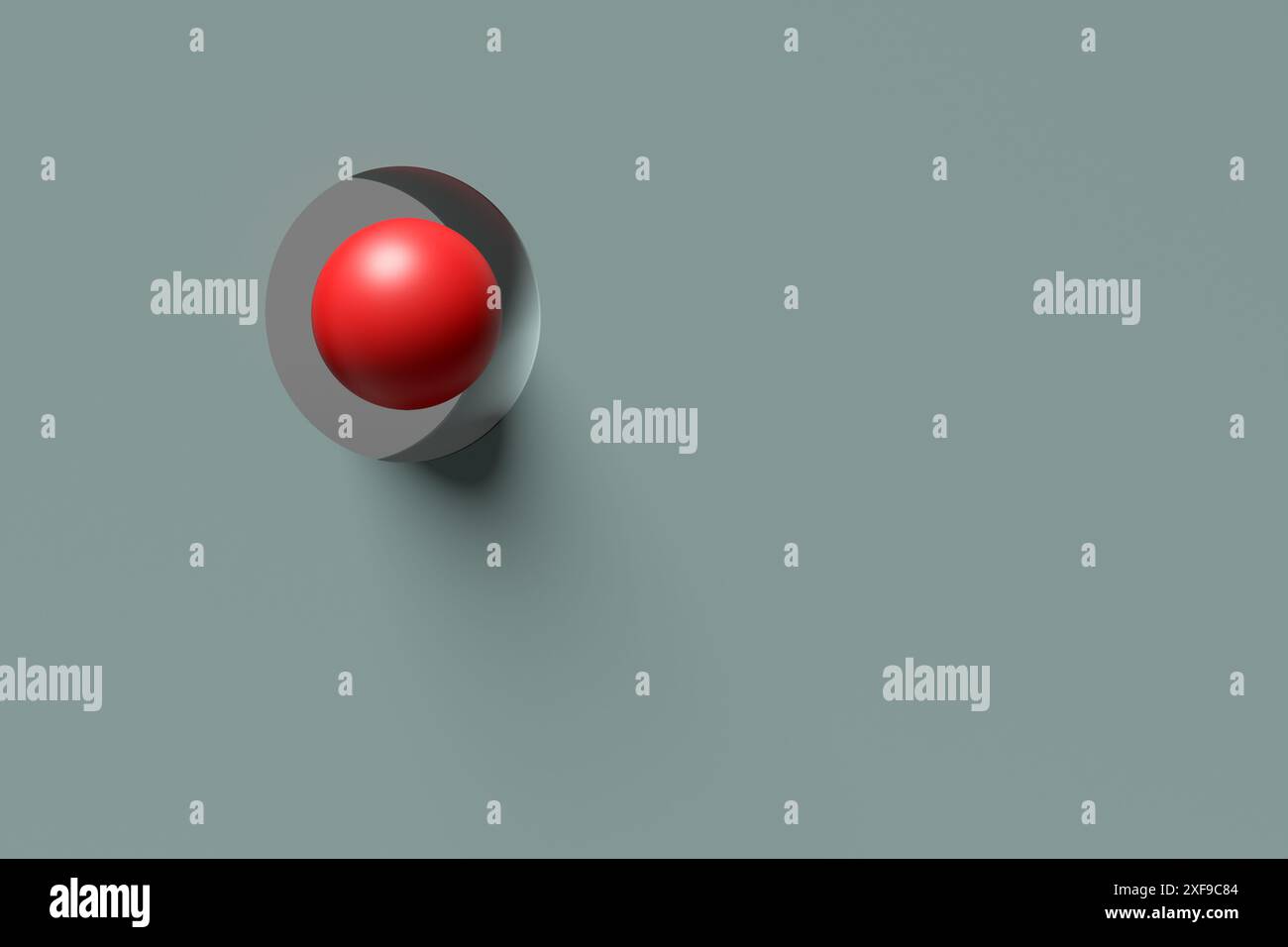 Minimalist still life of a red sphere passing through a hole in a green ...