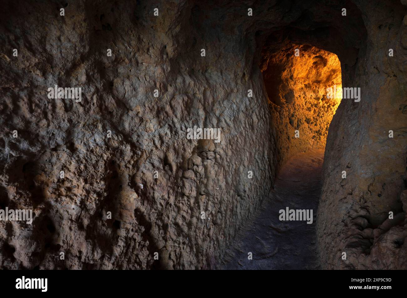 Light at the end of the tunnel, Algar Seco rock formation, coloured ...