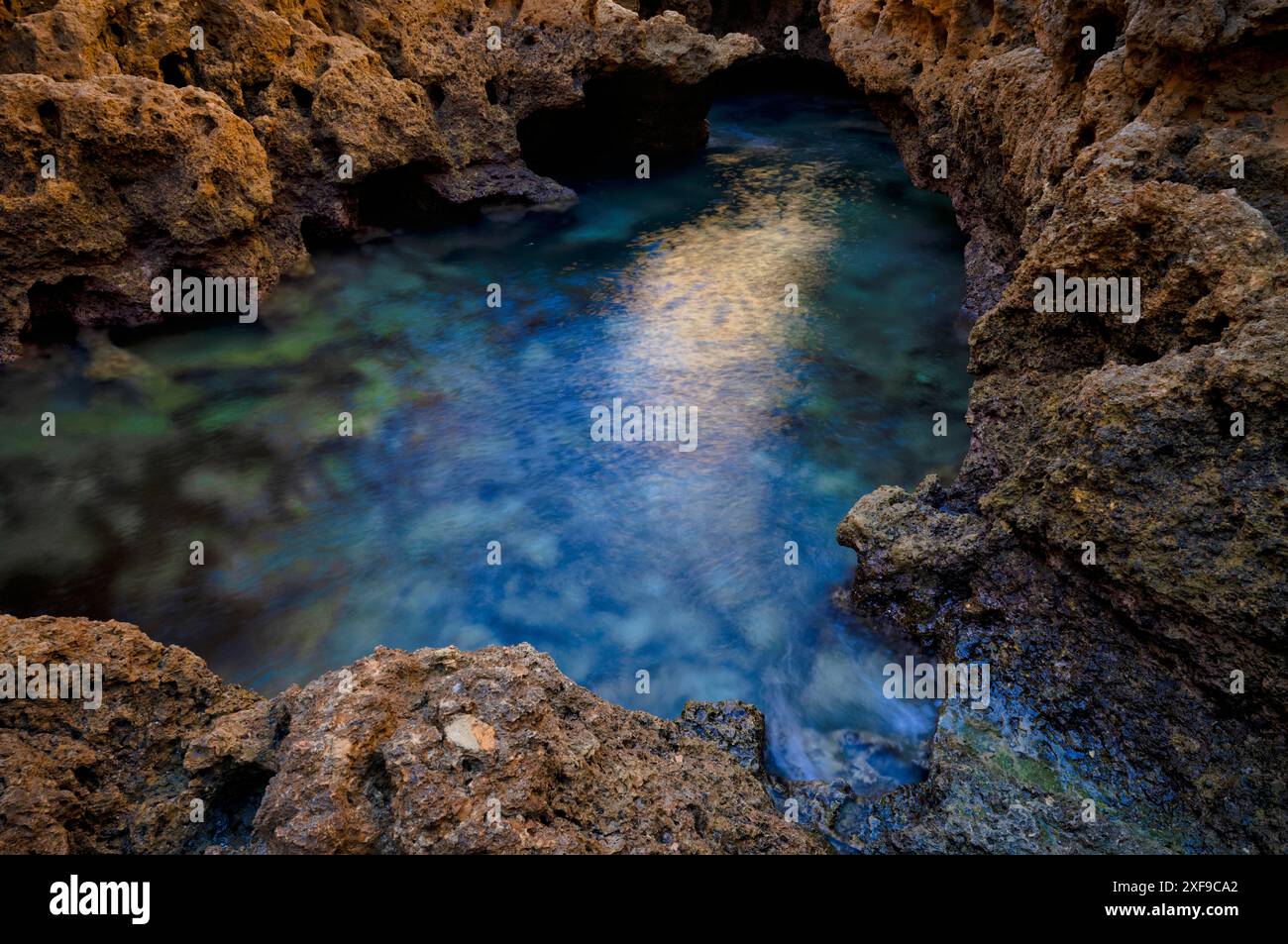 Algar Seco rock formation, coloured rocks and underground caves, caves, shell limestone ...