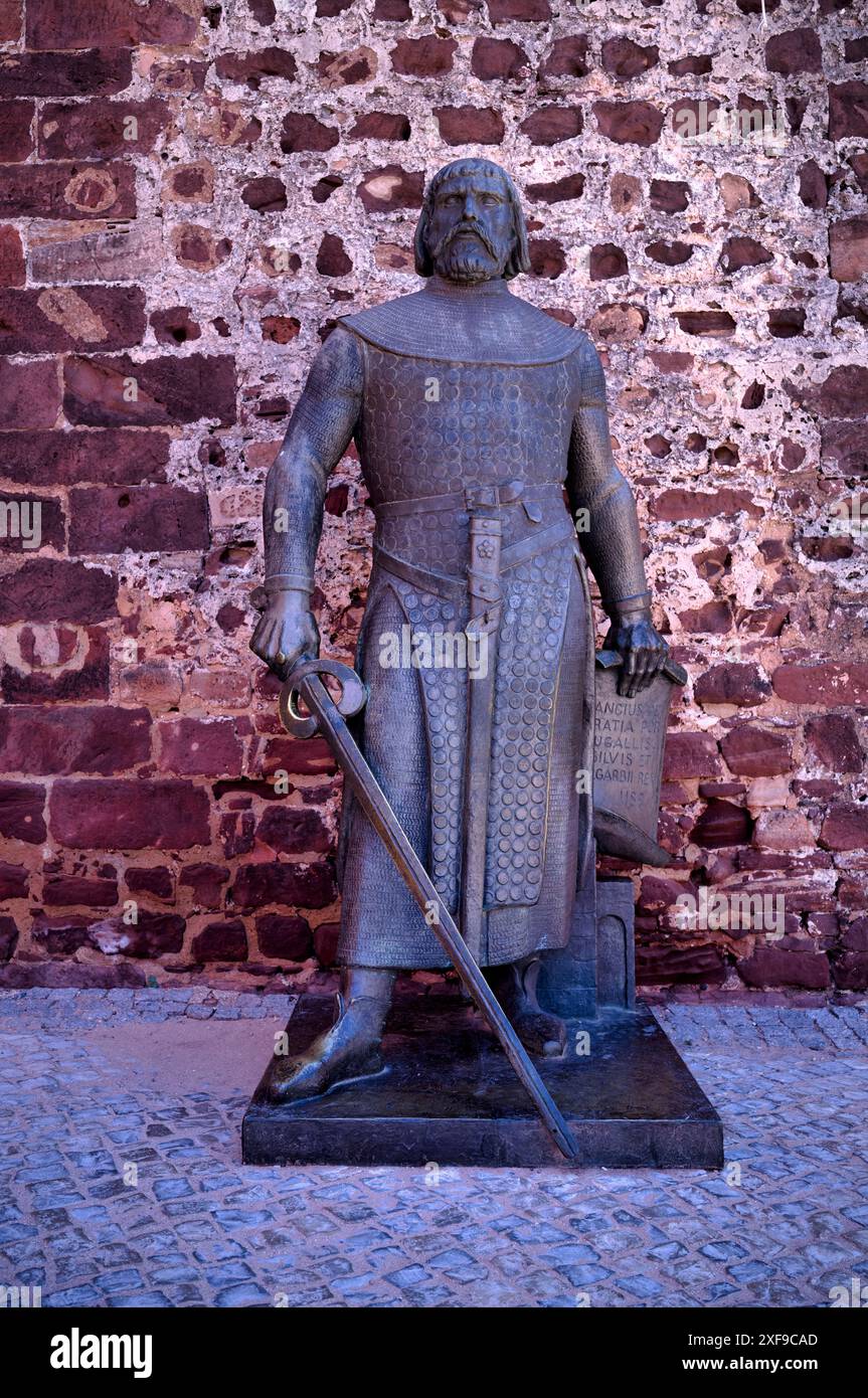Statue of King Sancho in front of the castle, Castelo de Silves, Algarve, Portugal Stock Photo ...