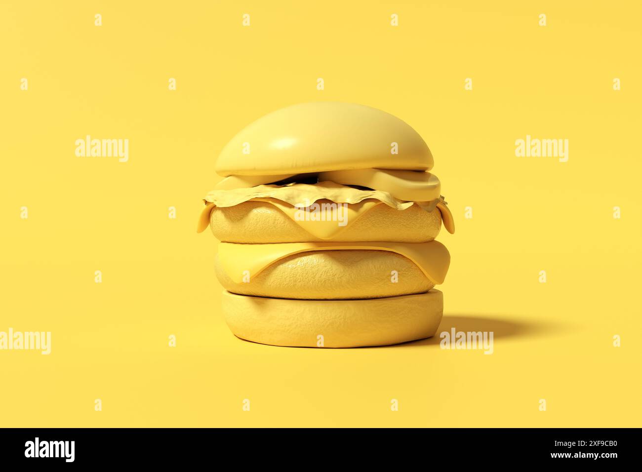 Monochromatic yellow cheeseburger standing on matching yellow ...