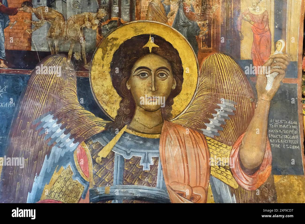 Antique fresco of an angel with halo and iconic details, Asklipio ...