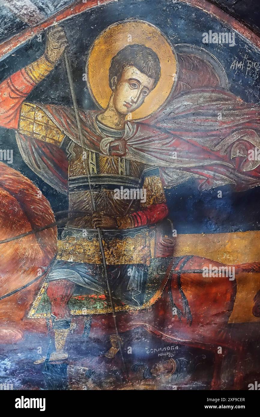 Medieval fresco of a saint in armour on a horse with halo, Asklipio ...