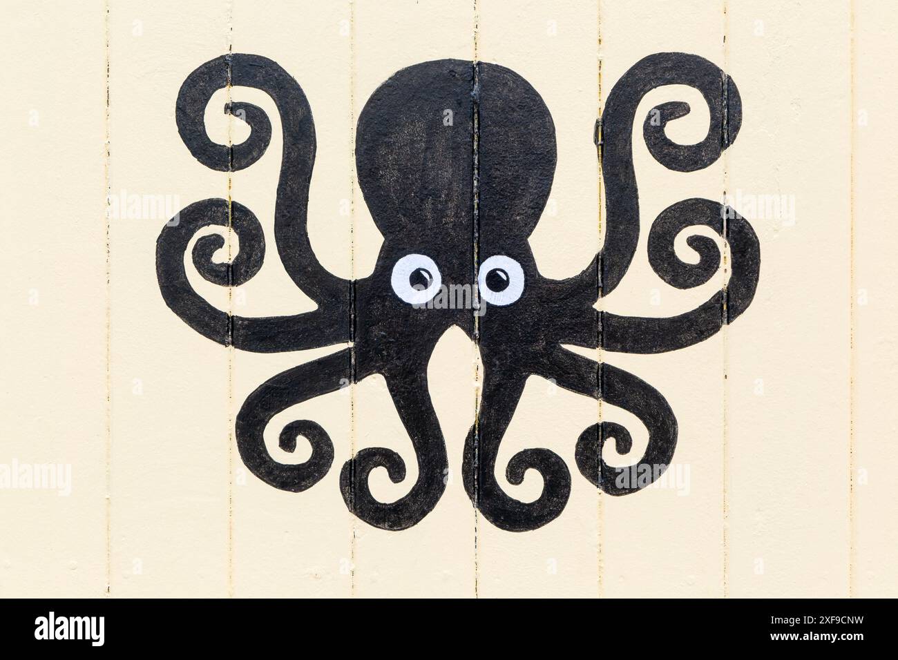 Octopus picture painted on side of wooden seaside beach hut, Felixstowe ...