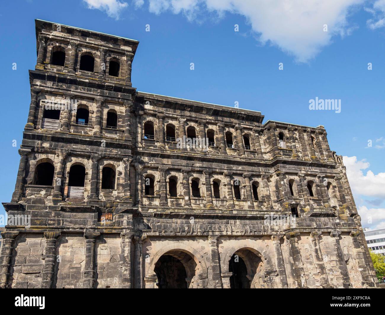 Antique building with stone walls under a clear sky, trier, germany ...