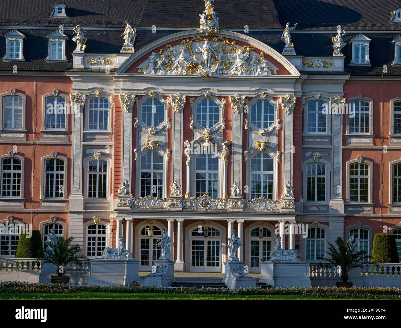 Detail of the baroque palace facade with richly decorated sculptures ...