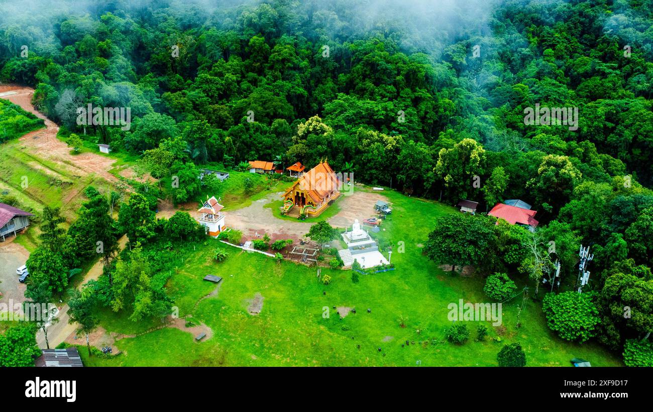 Aerial view of the beautiful Sapan temple scenery with a white Buddha ...