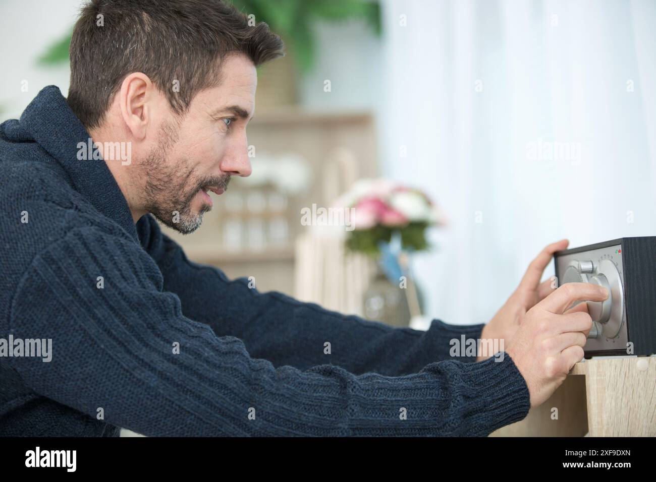 Person listening to transistor radio hi-res stock photography and ...