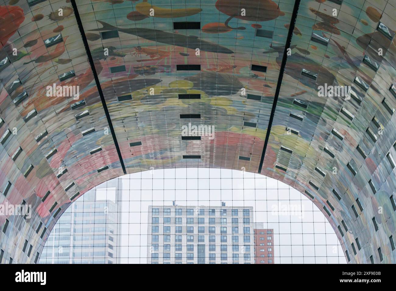 Interior view of a modern market hall with colourful ceiling paintings ...