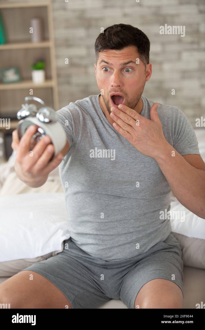 man worry about time left till work Stock Photo - Alamy