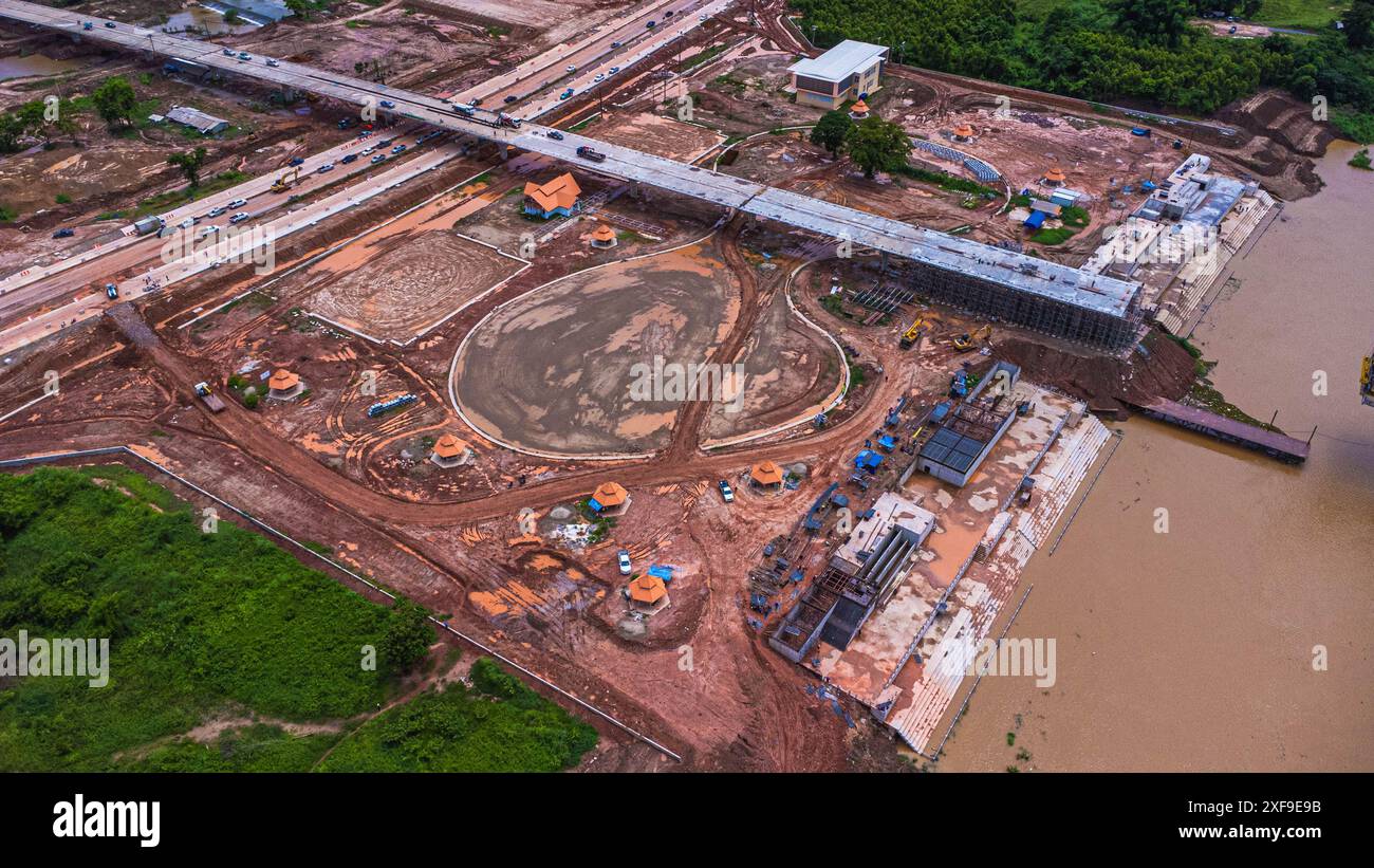 Aerial view of the construction site of the bridge over the Mekong ...