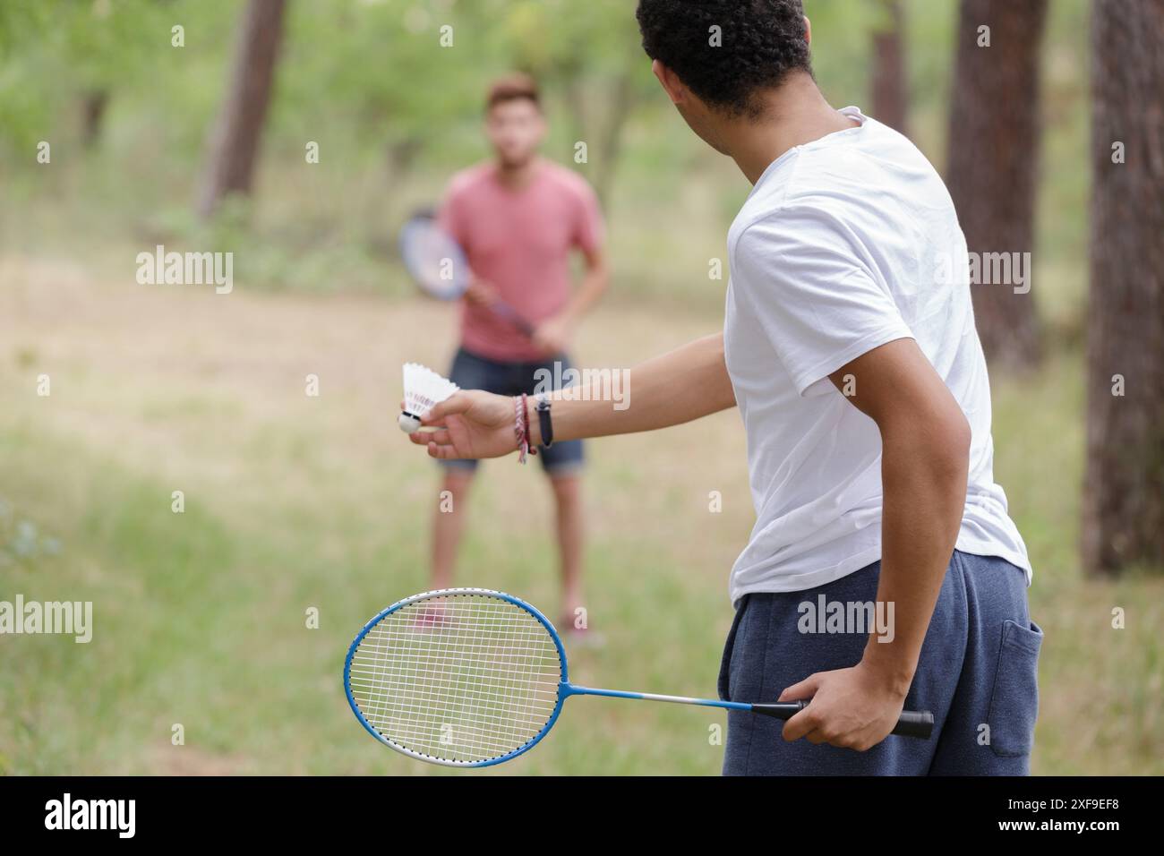 Friends playing badminton hi-res stock photography and images - Alamy