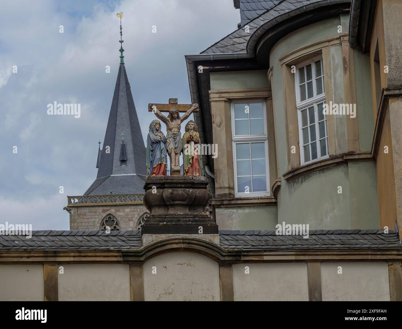 A detailed view of the top of a church spire, together with religious ...