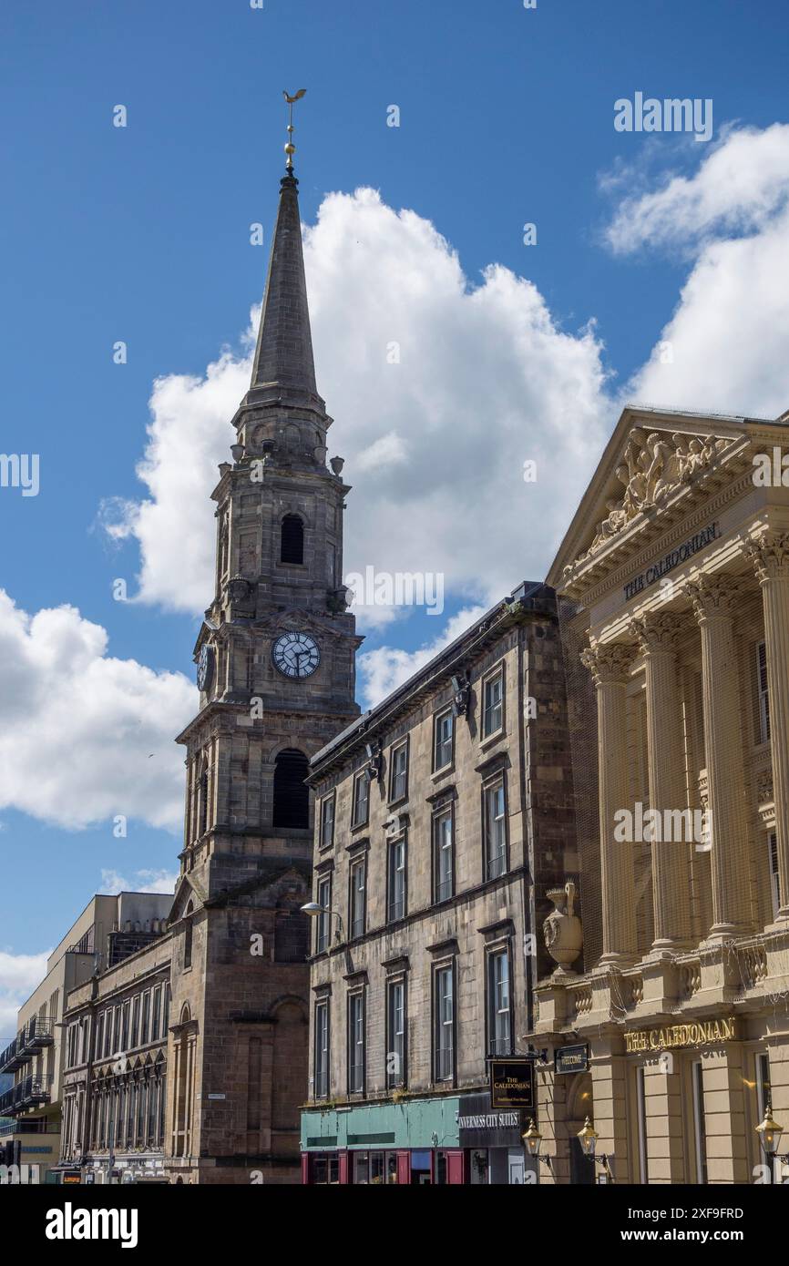 Historic cityscape with a tall church tower and other old buildings ...