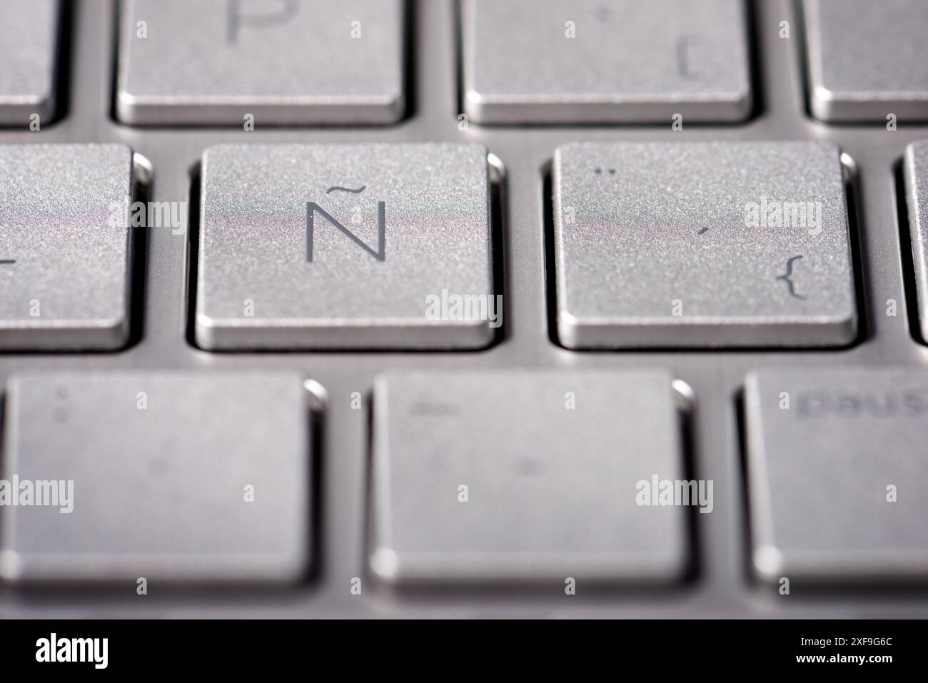 Close up of special letter n of the Spanish alphabet on a grey keyboard ...