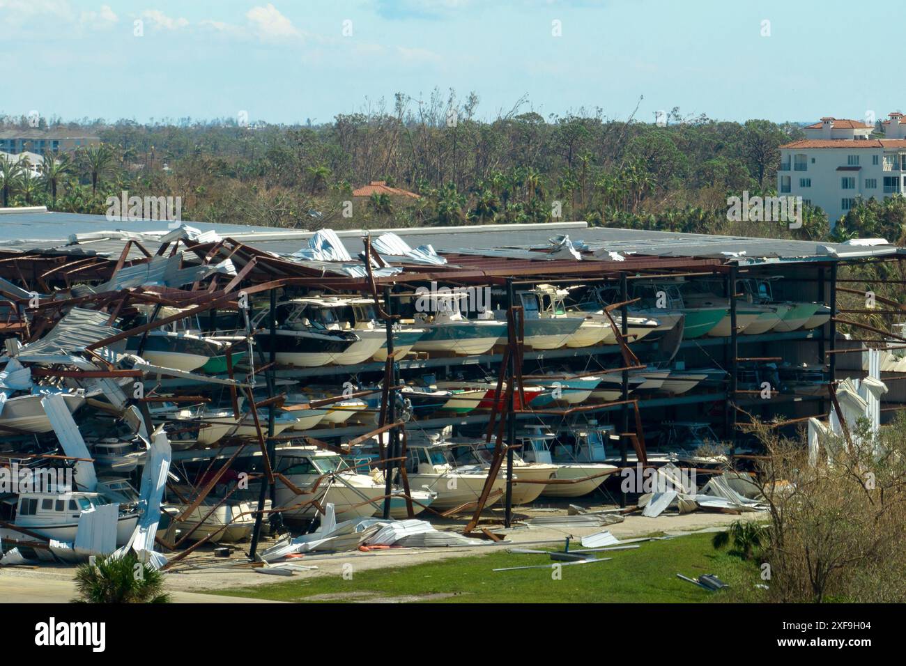 Warehouse with motorboats and yachts destroyed by hurricane winds in ...
