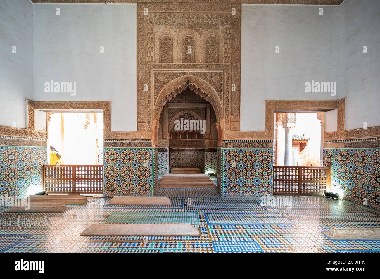Very ornate, arabic archway, covered in carved wood and mosiac tiles ...
