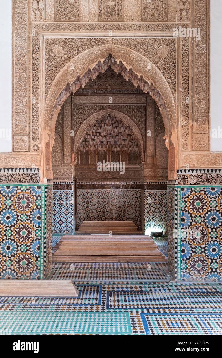 Very ornate, arabic archway, covered in carved wood and mosiac tiles ...