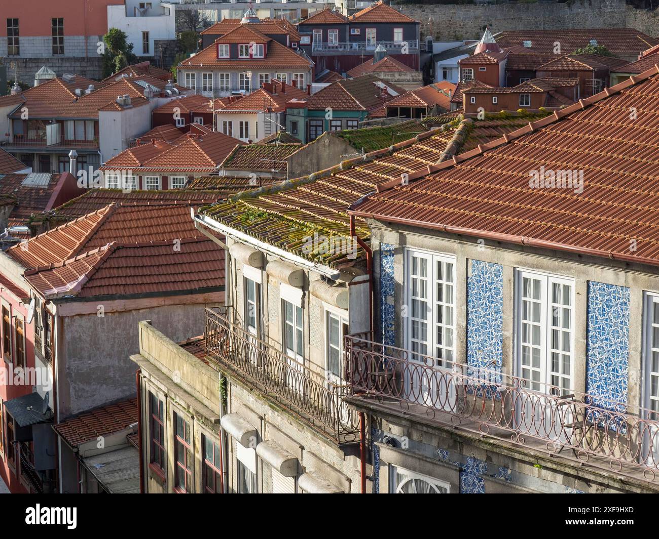 Roofs and houses in the historic city centre with small balconies and ...