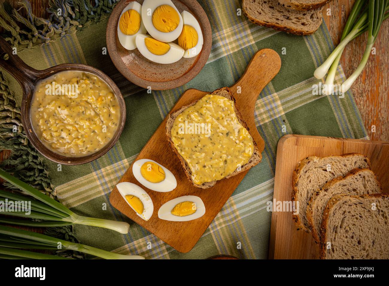 Delicious homemade egg spread on toast bread, top view Stock Photo - Alamy