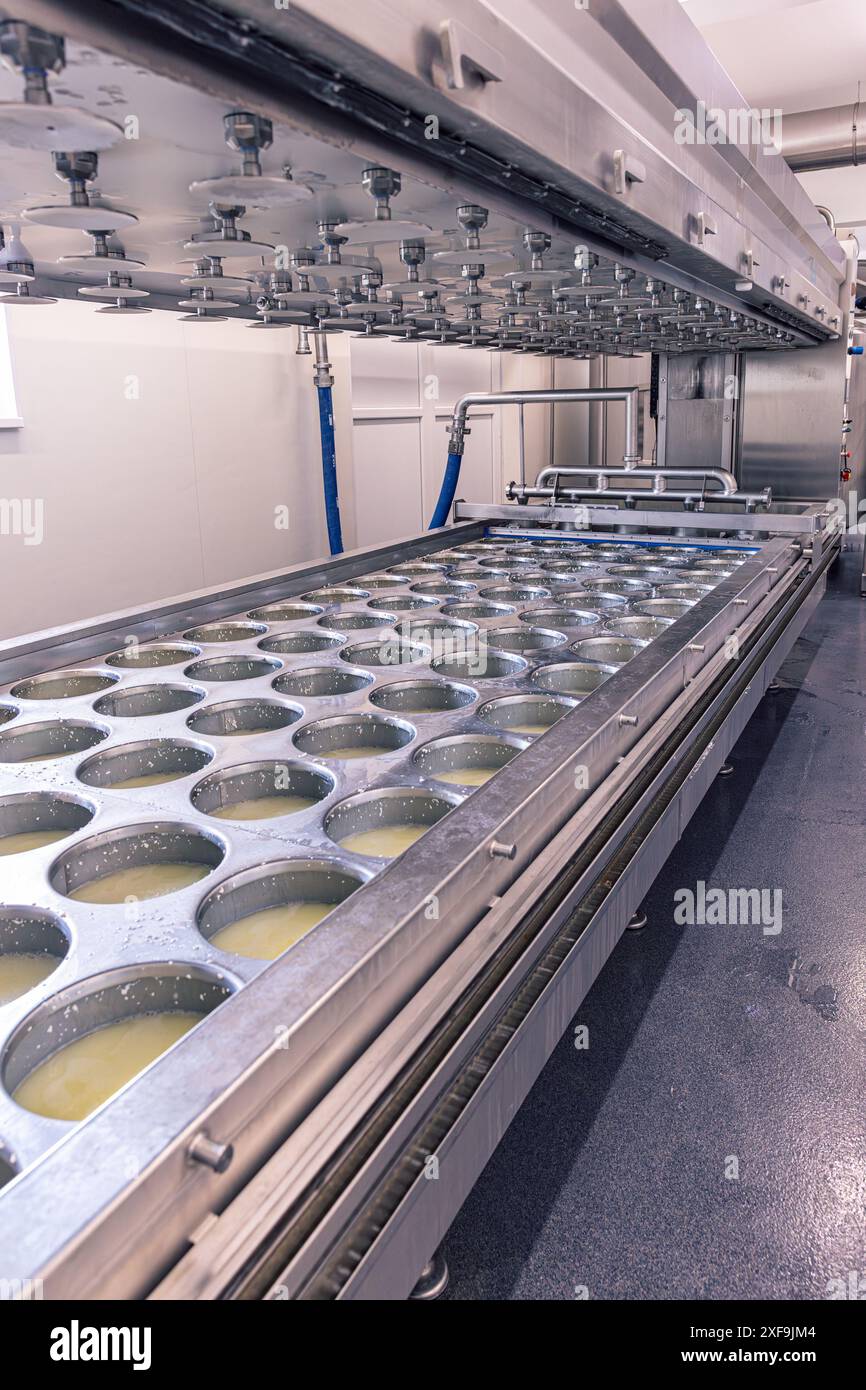 Factory worker pressing cheese curds hi-res stock photography and ...