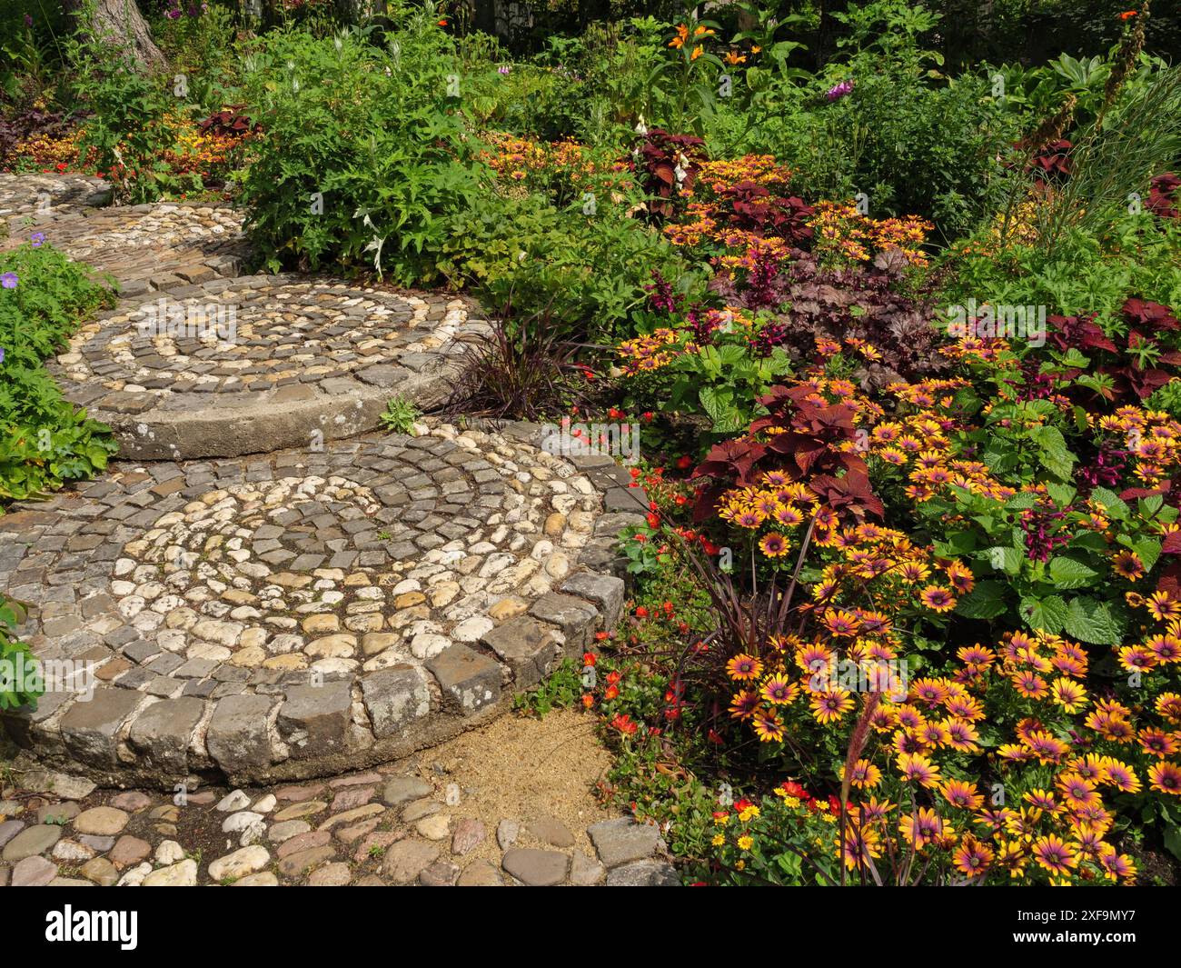 Paved path leads colorful hi-res stock photography and images - Alamy