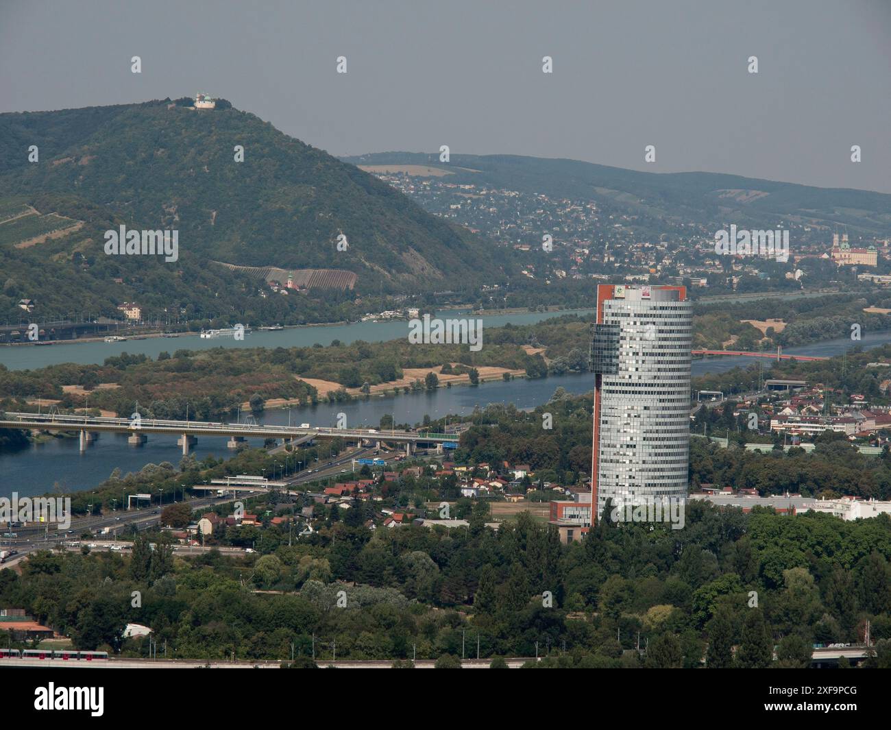 Panorama with skyscraper, river and surrounding landscapes, including ...