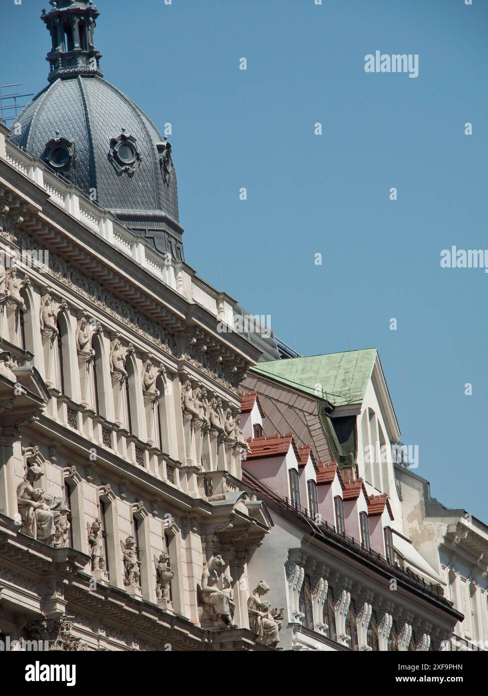 Detailed historical facade of a building with sculptures and various ...