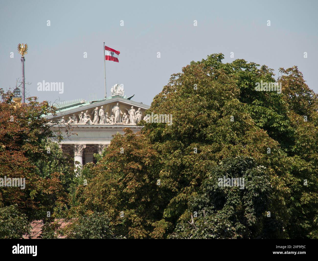 Building with Austrian flag and classical architecture, surrounded by ...