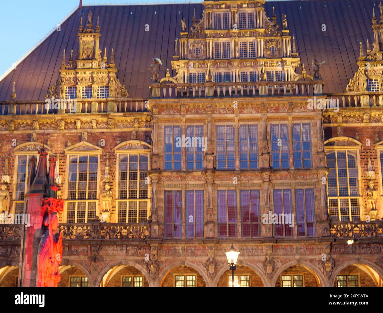 Historic facade of a building with magnificent night lighting, Bremen ...