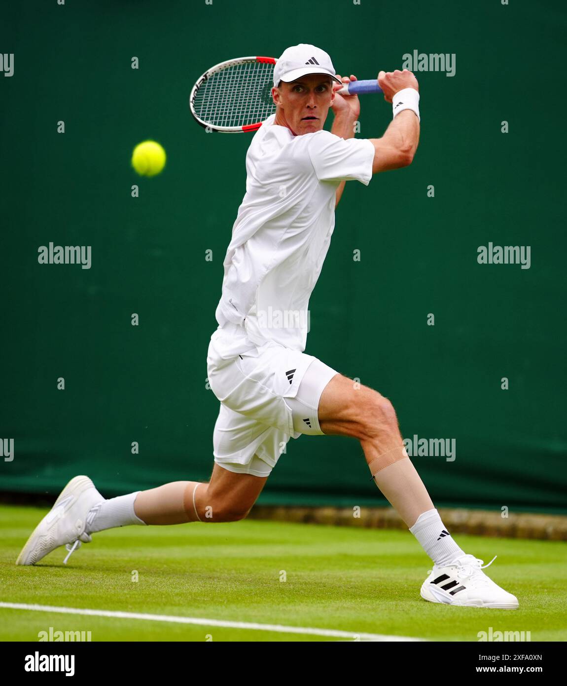 Jan Choinski in action against Luciano Darderi (not pictured) on day ...