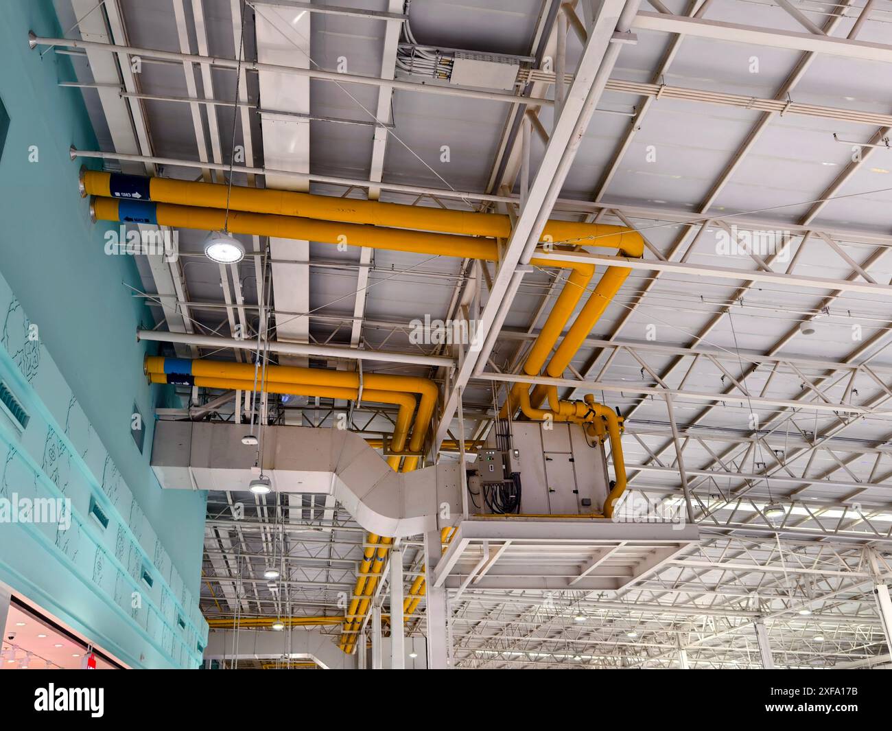 Ceiling with ventilation pipes and lights in industrial building Stock ...