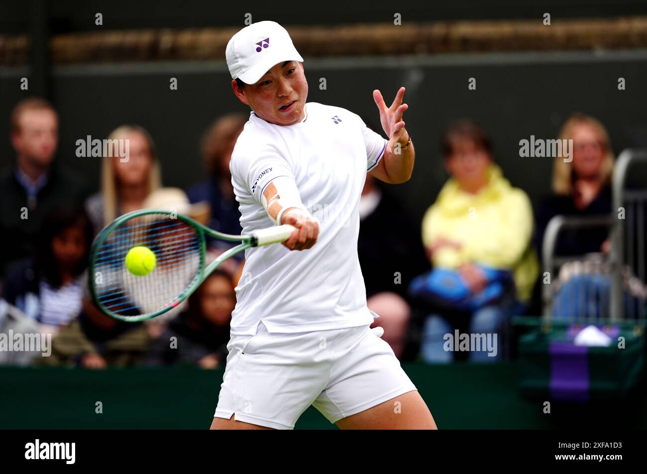 Zhuoxuan Bai in action against Harriet Dart (not pictured) on day two ...