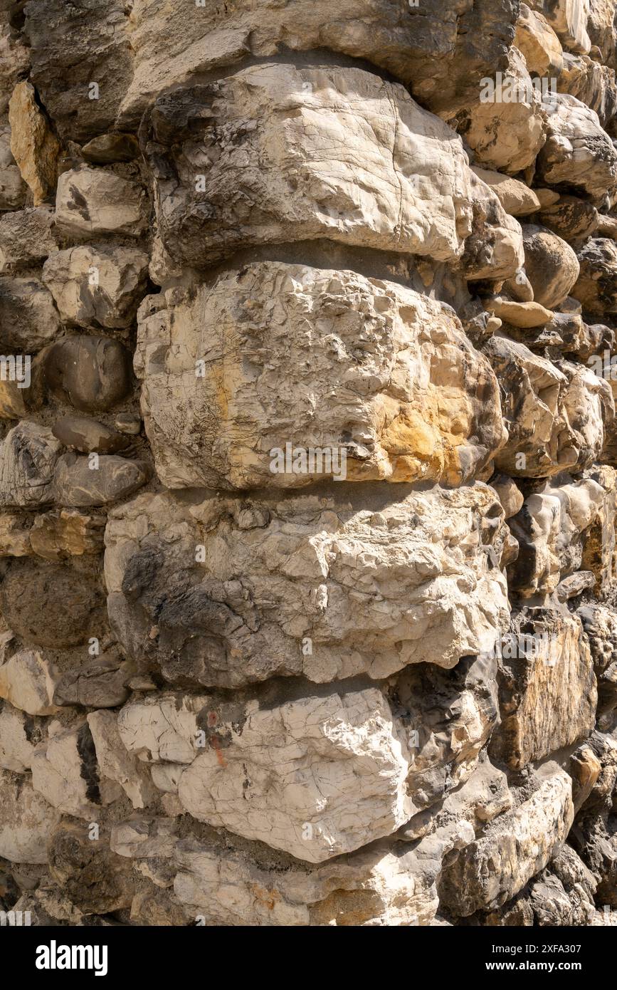 Edge of two walls of an ancient building with limestones, where big ...